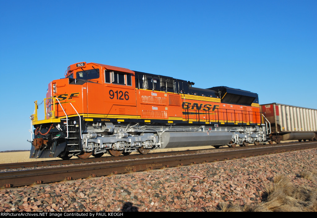 BNSF 9126 waits to roll eastbound as the Rear DPU on a Loaded Coal Train.